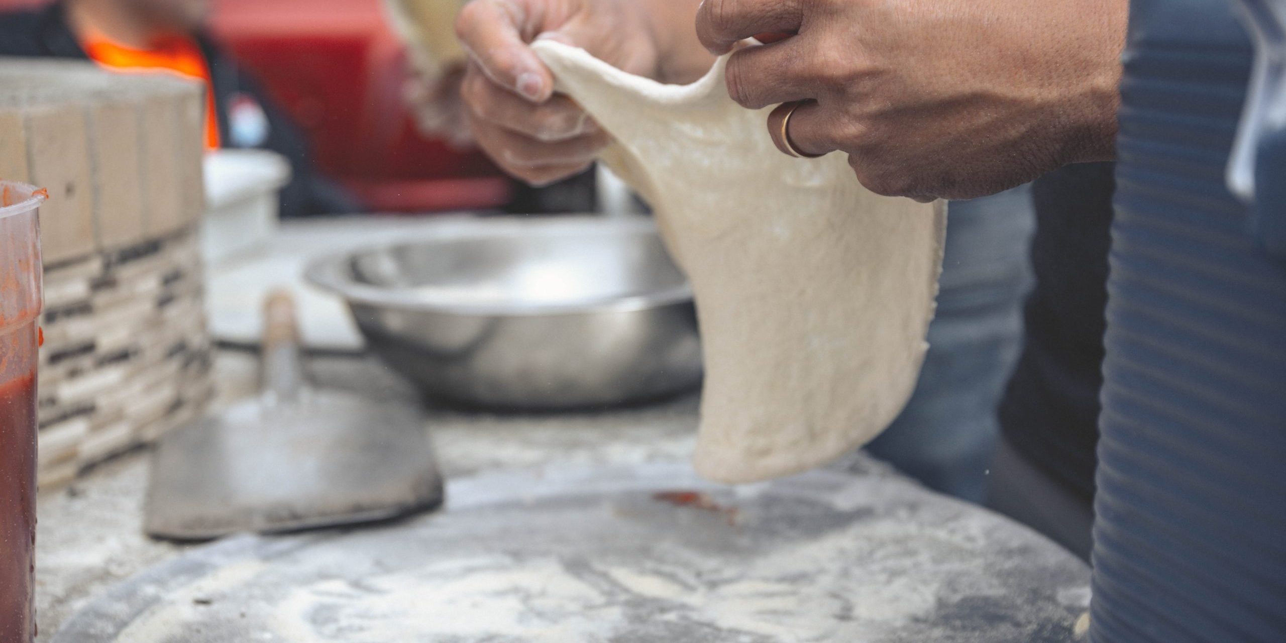 Is a Dough Press Better Than Hand Tossed? - Twothousand Machinery